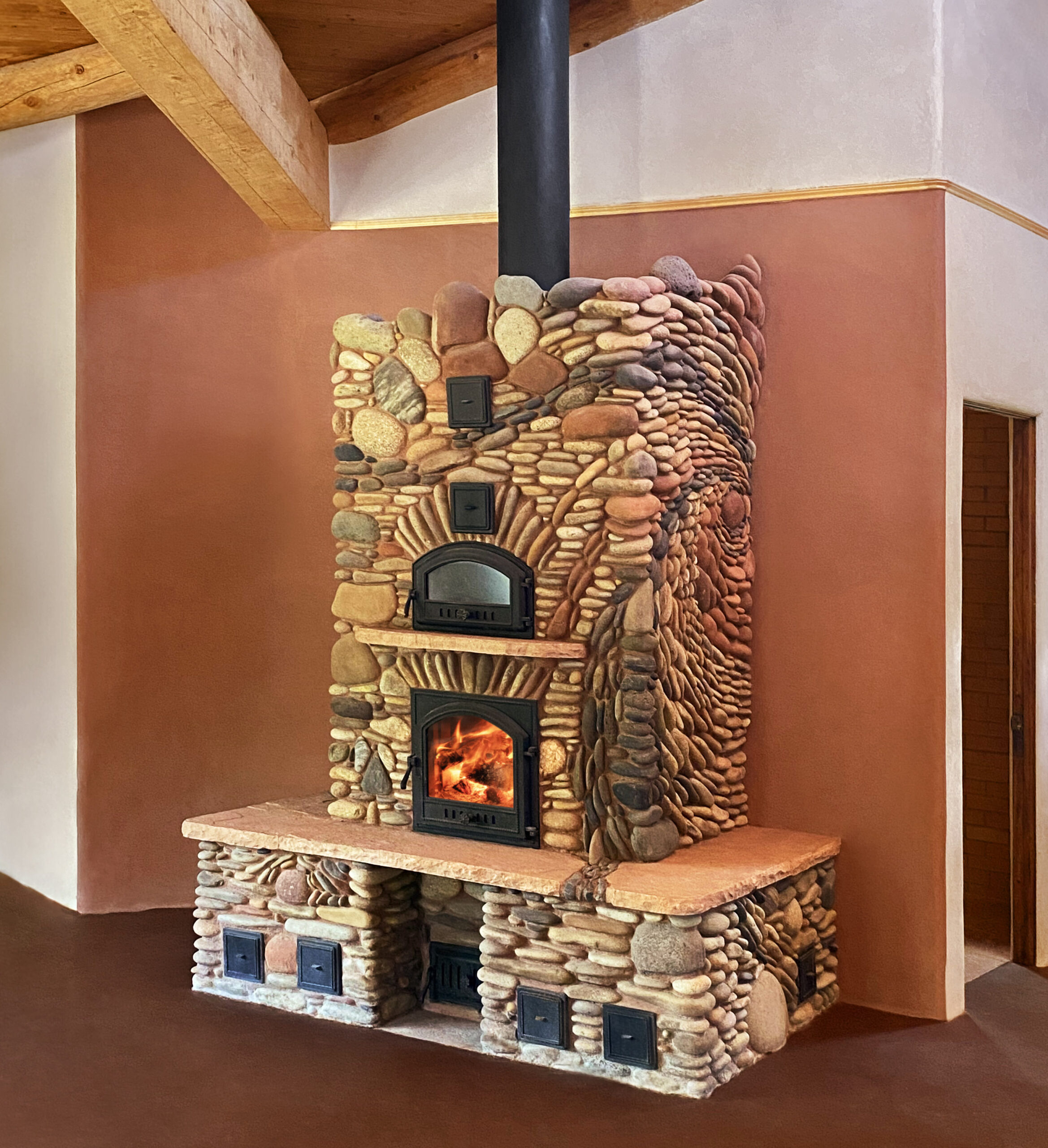 The River Rock Masonry Heater - Firespeaking